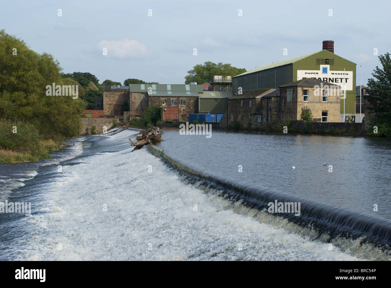 The weir and a paper factory on the river Wharfe at Otley Leeds West ...