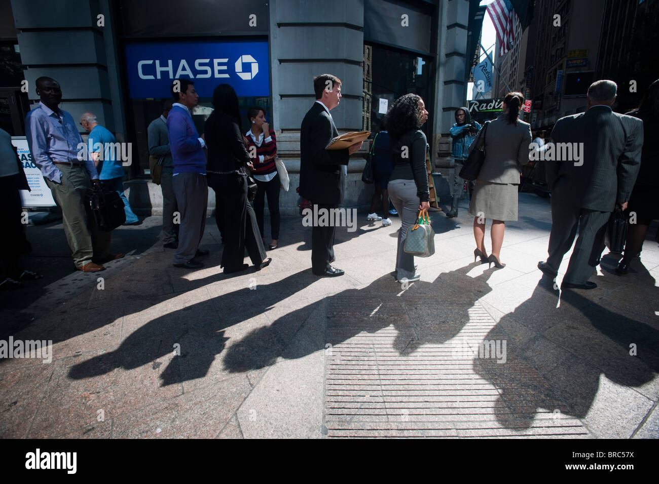 Job seekers line up for a job fair in midtown in New York on Wednesday ...