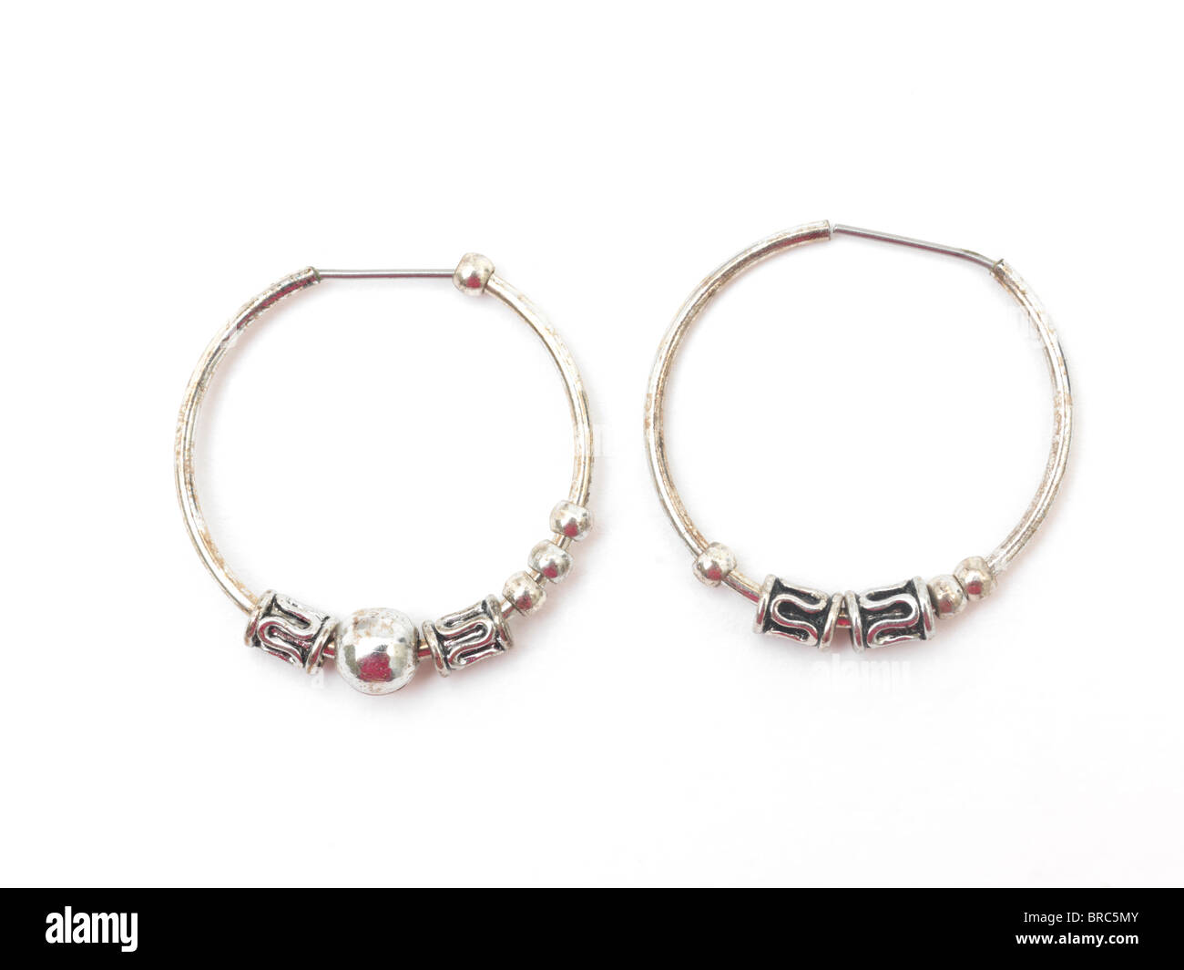 Silver Hoop Earrings Stock Photo - Alamy