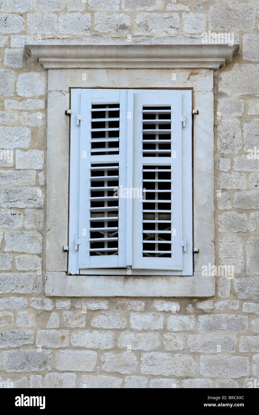 A wooden shuttered window Stock Photo - Alamy