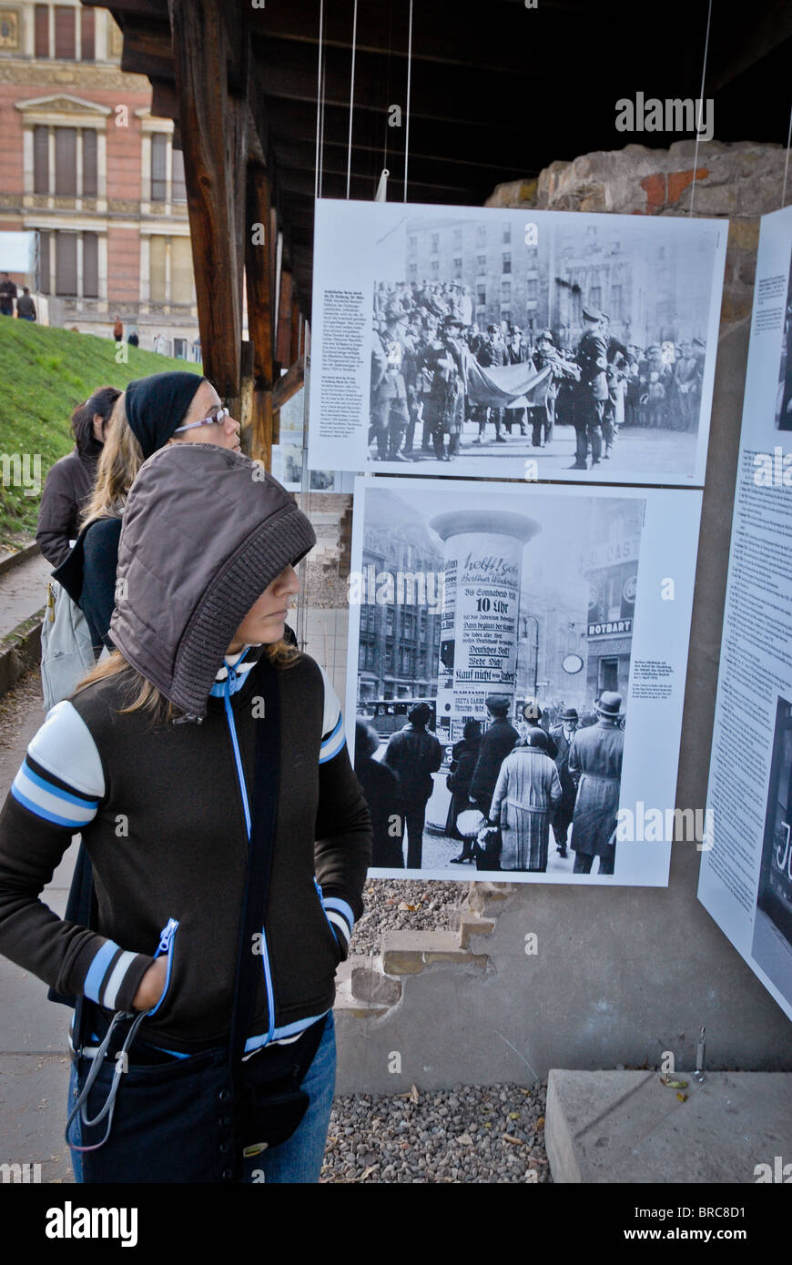 A tourist at the Topographie Des Terrors, Berlin, Germany. Within the ...