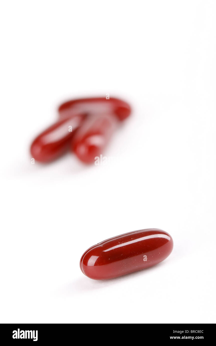 Red vitamin pills Cut Out Stock Images & Pictures - Alamy