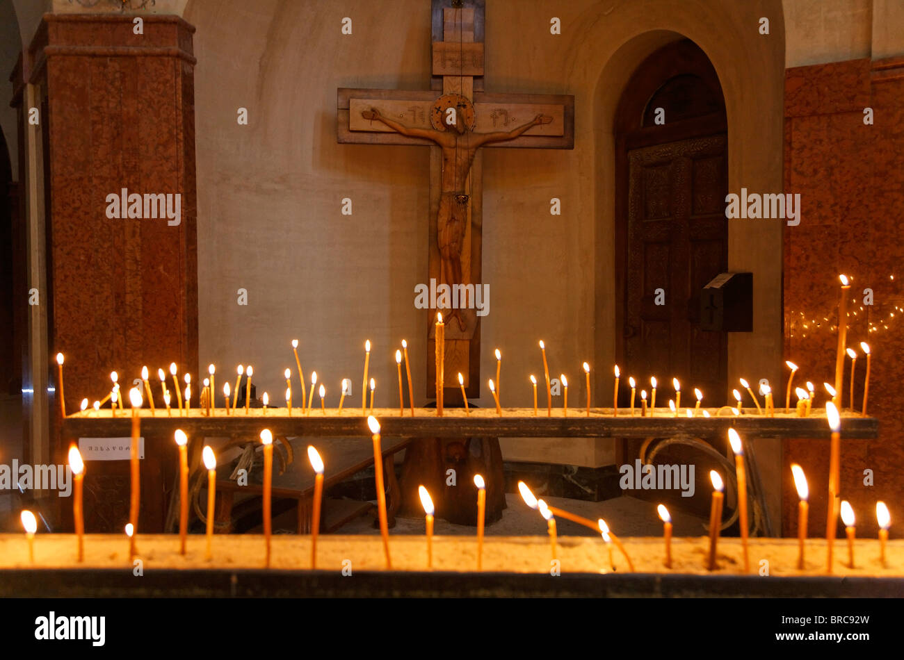 Candles inside the Tsminda Sameba Cathedral, Tbilisi, Georgia Stock ...