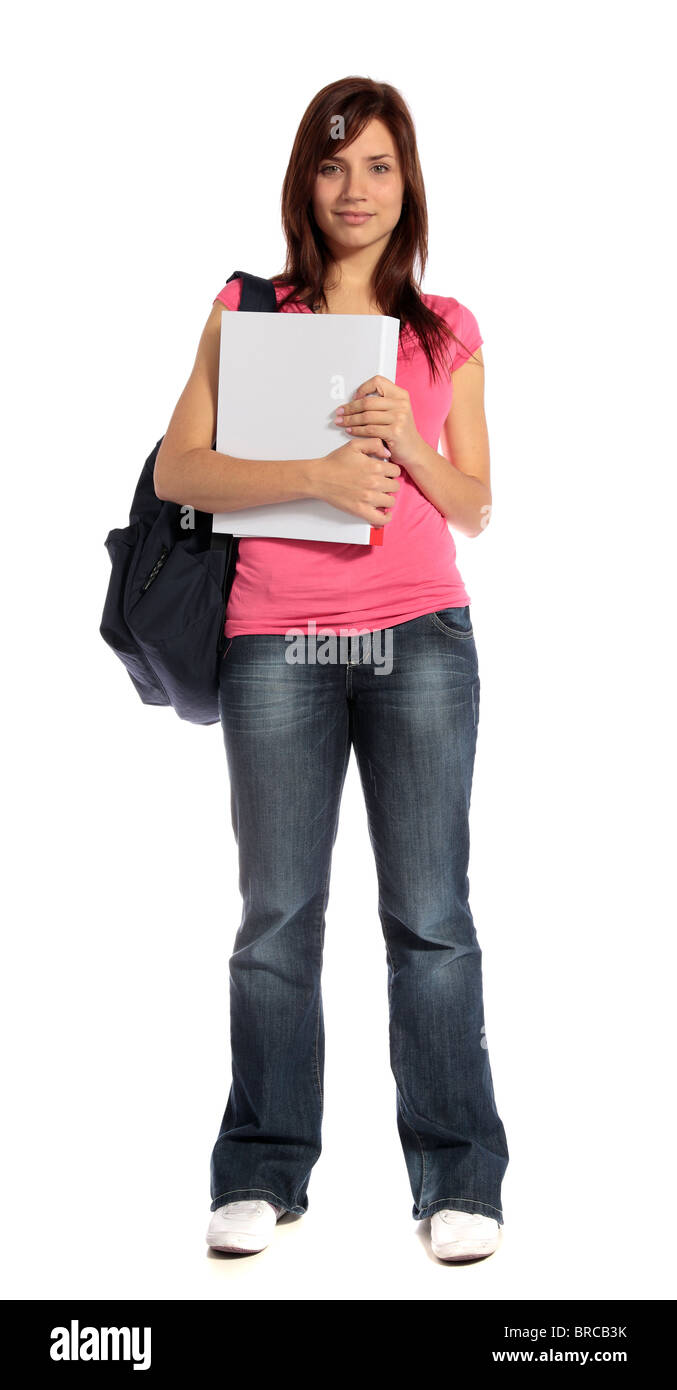An attractive student standing in front of a plain white background ...