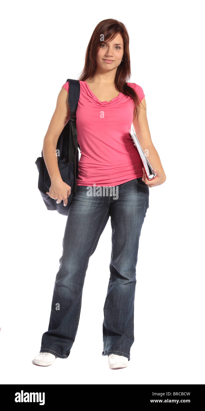 An attractive student standing in front of a plain white background ...