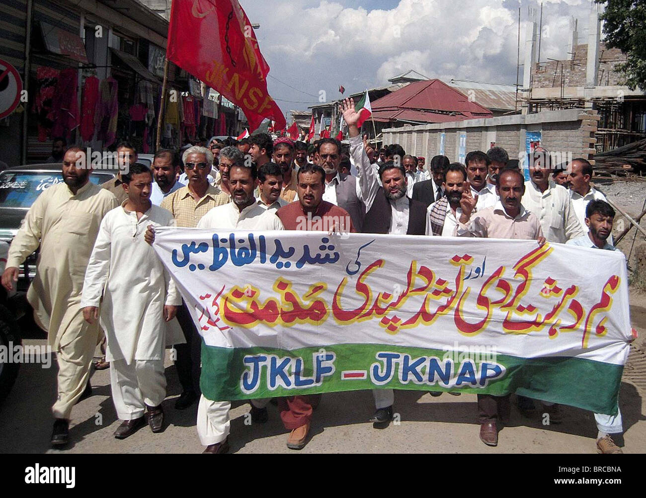 Supporters of Jammu Kashmir Liberation Front pass through a road during ...