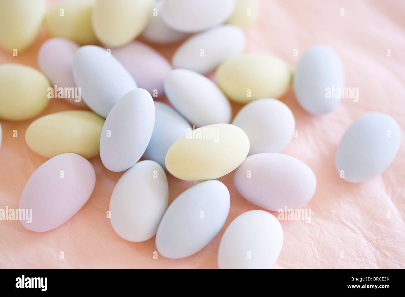 Sugar almond on wrapping paper Stock Photo - Alamy