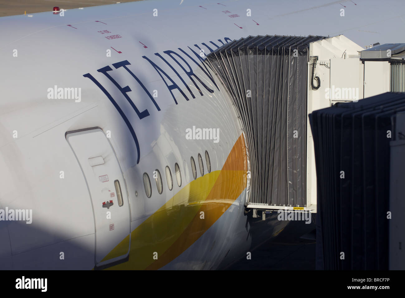 Passenger walkway connected to Jet Airways Boeing 777 at Heathrow ...