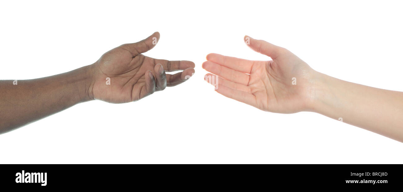 Two persons of different skin color reaching hands. All on white ...