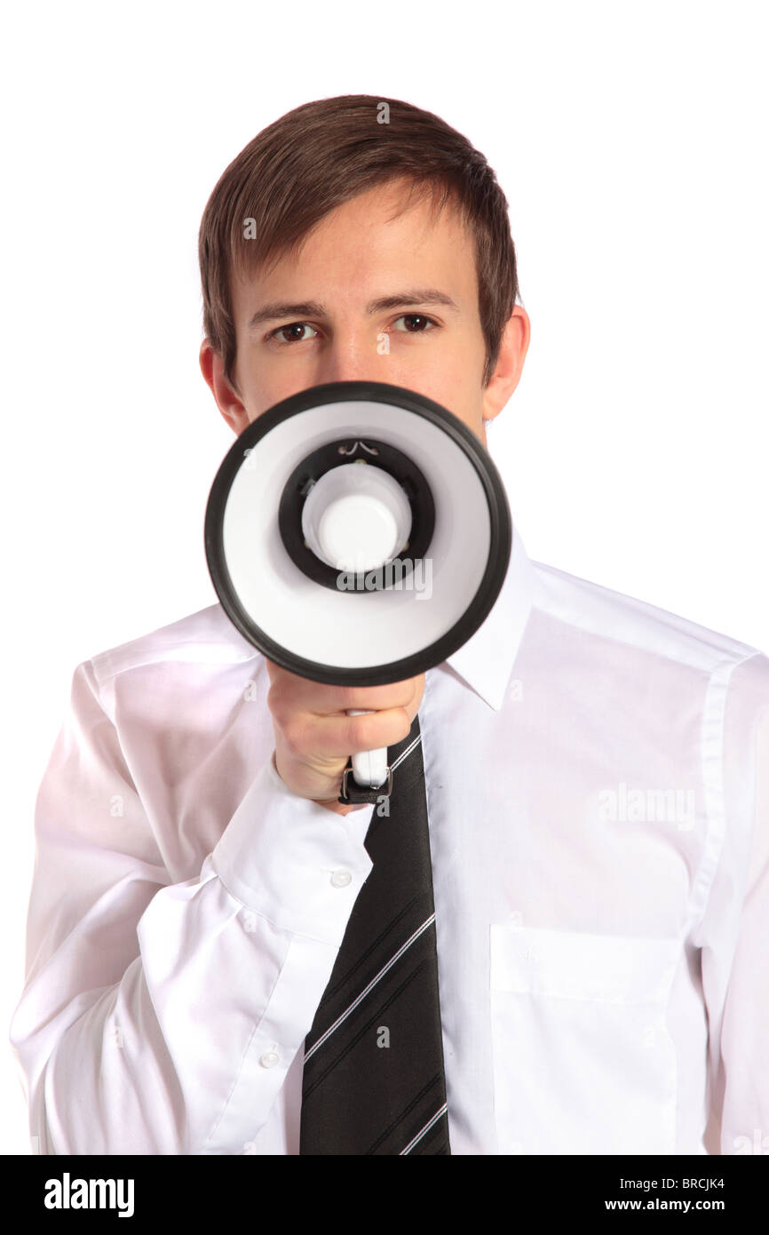 A young businessman using a megaphone. All isolated on white background ...