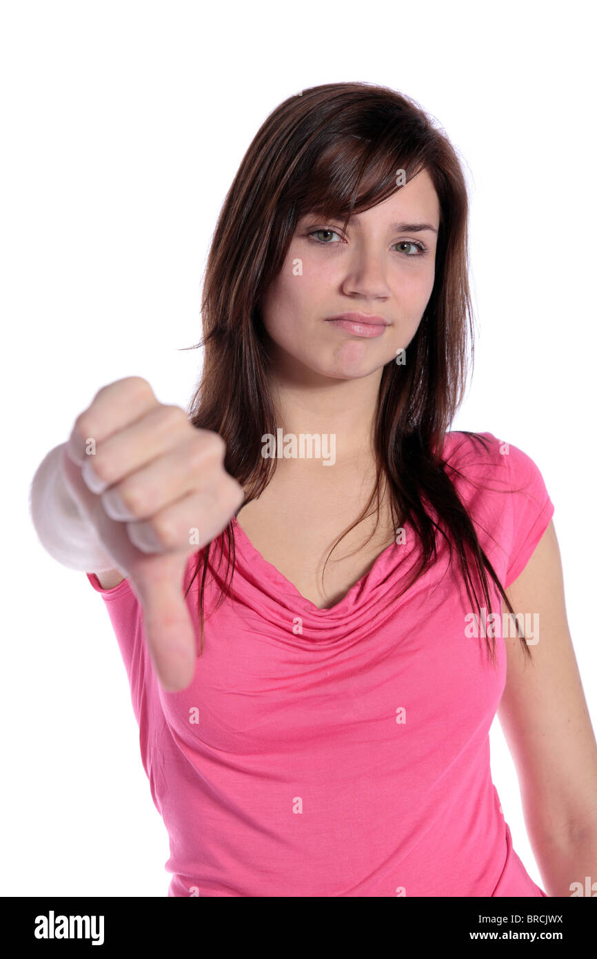 An attractive young woman making a negative gesture. All on white ...