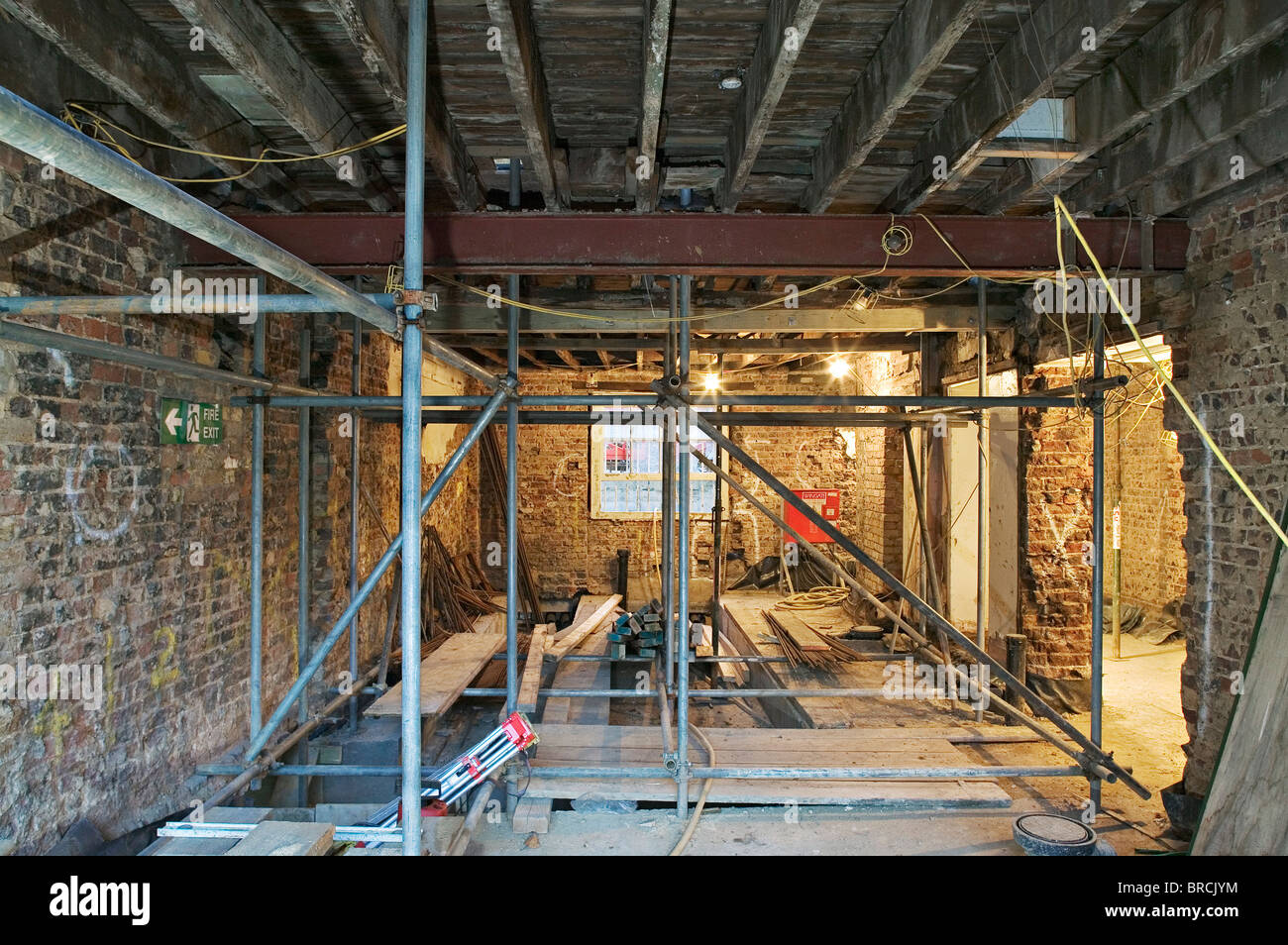 Ceiling support poles and RSJs on building site Stock Photo - Alamy
