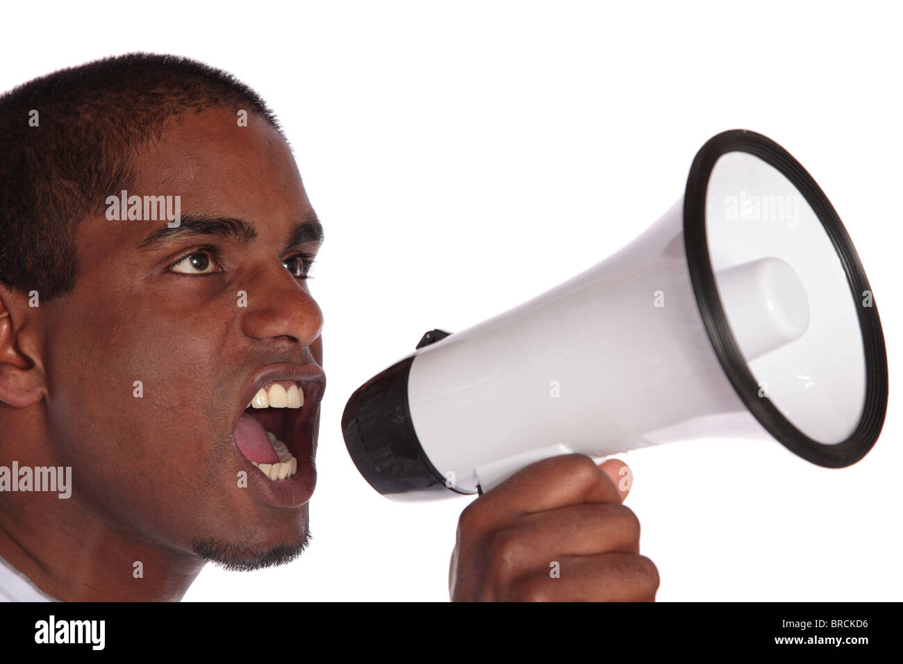 An attractive dark-skinned man using a megaphone. All on white ...