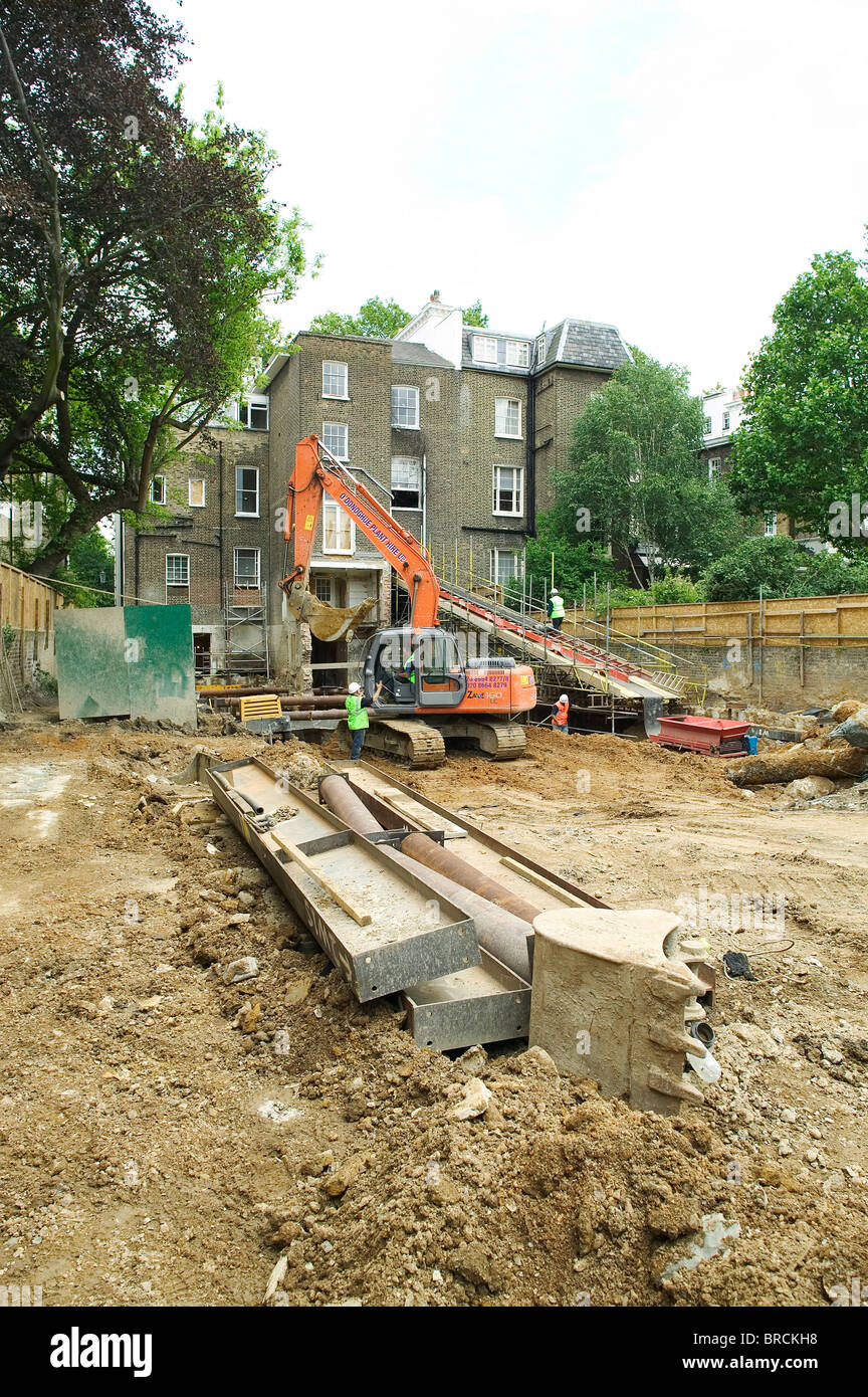 Diggers on building site Stock Photo - Alamy
