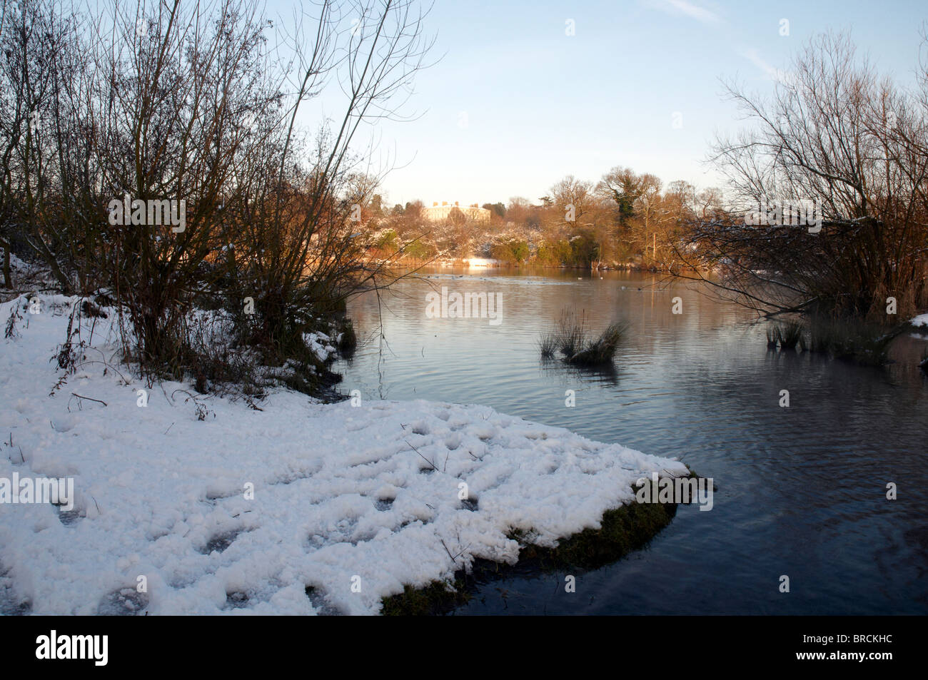 A view of a lake in winter with snow Stock Photo - Alamy