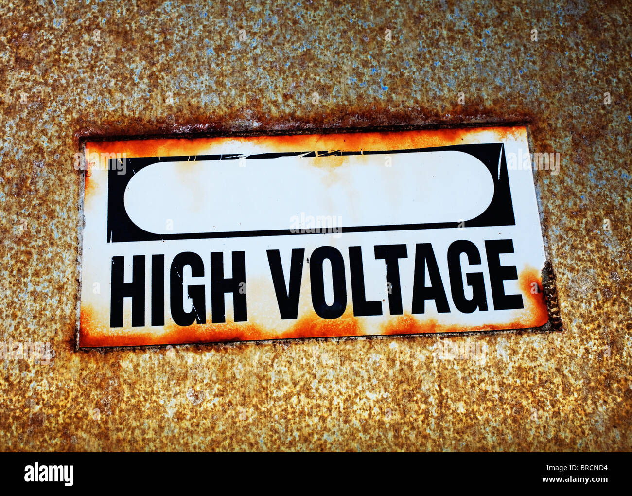 old and faded high voltage sign mounted onto power box Stock Photo - Alamy
