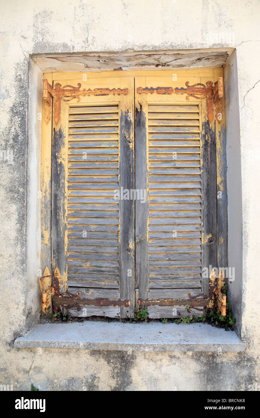 Old Yellow Window Shutters Stock Photo - Alamy
