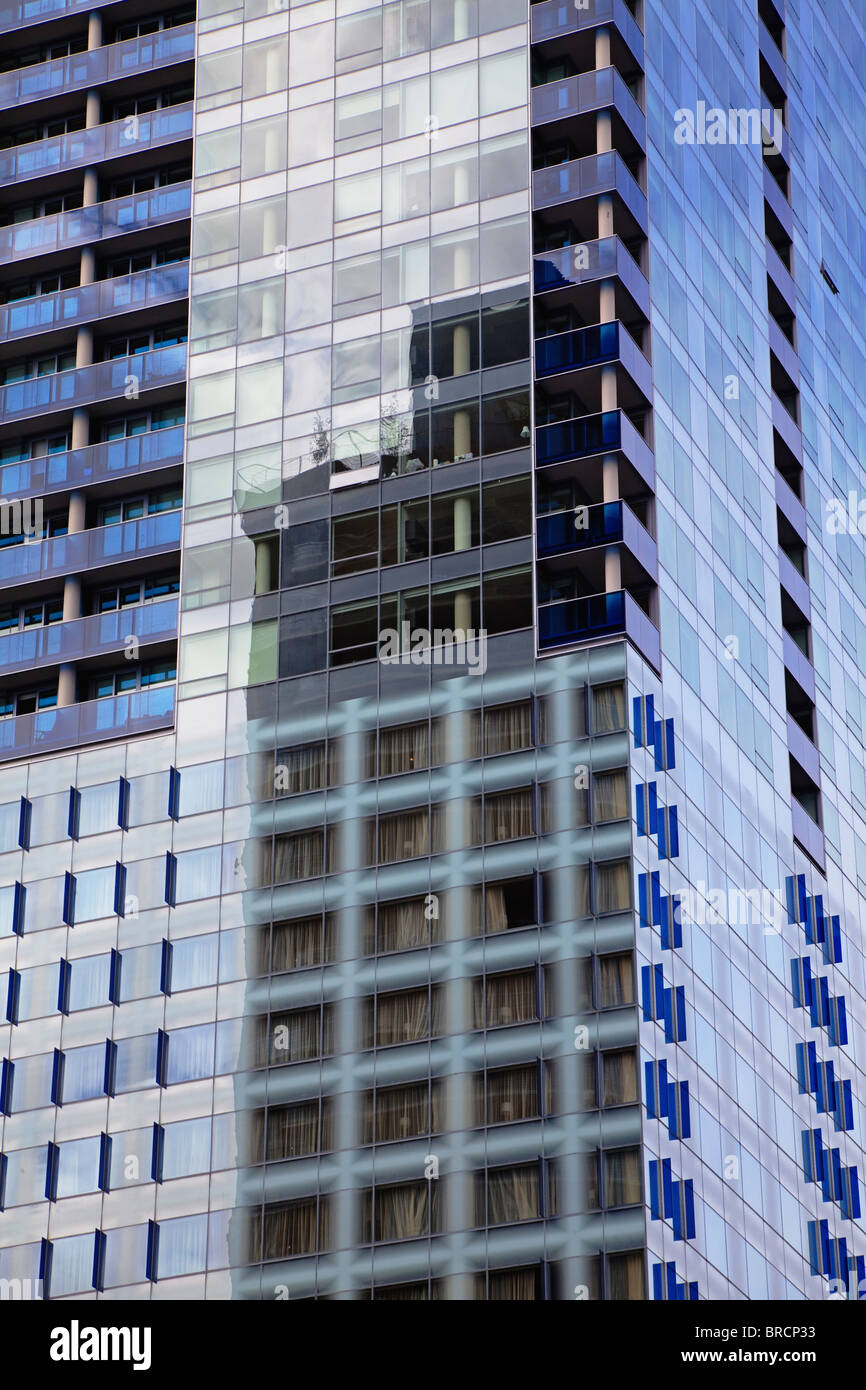 light and shadow on blue and silver skyscraper Stock Photo - Alamy