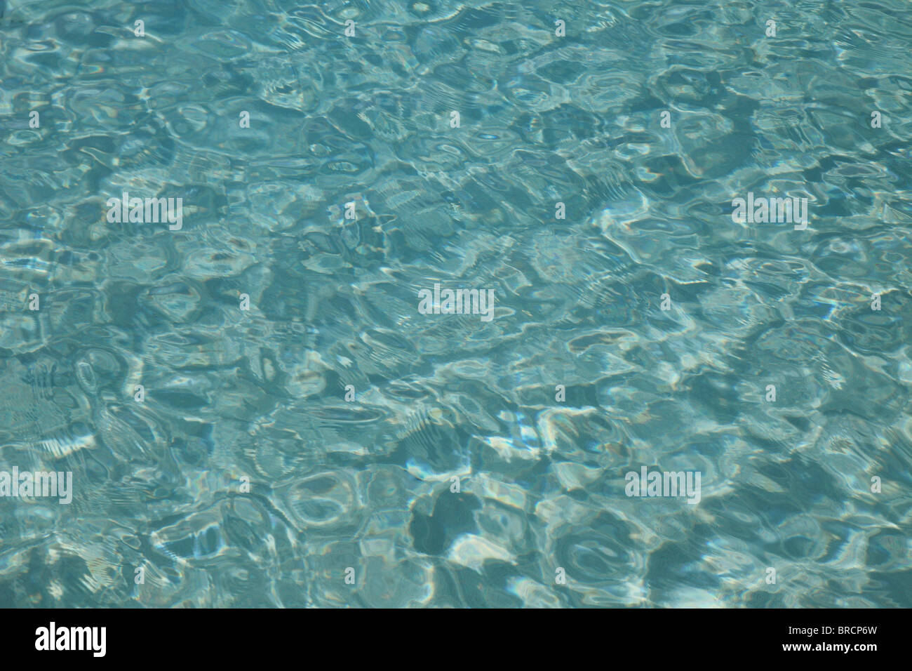 Turquoise water surface of a swimming pool Stock Photo - Alamy