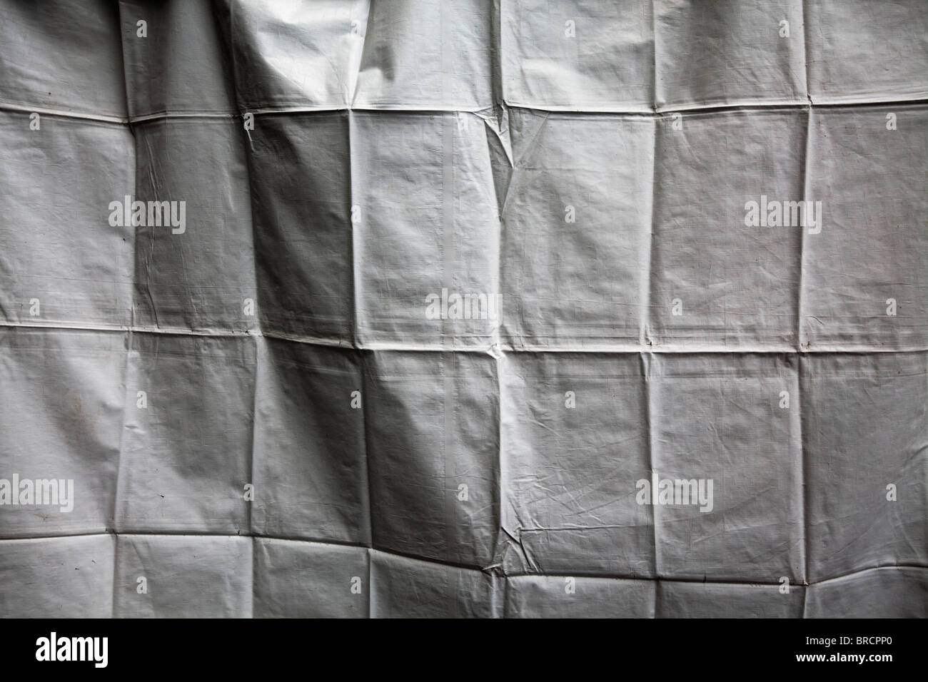 wall of tarp tent in public park Stock Photo - Alamy