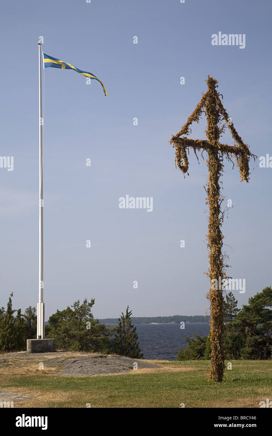 Midsummer tree and Swedish pennant on the bank of Lake Vanern, Säffle ...