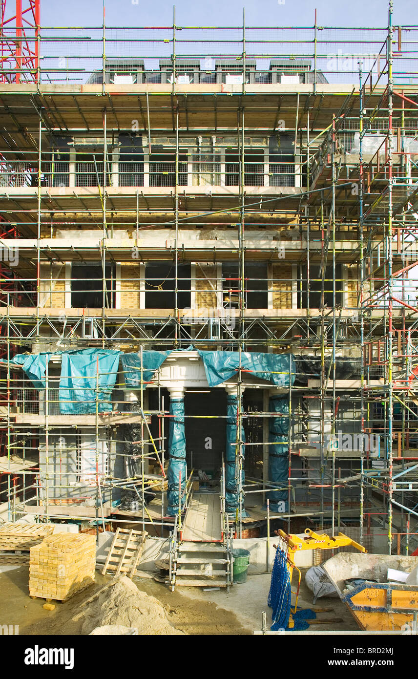House in construction with scaffolding Stock Photo - Alamy