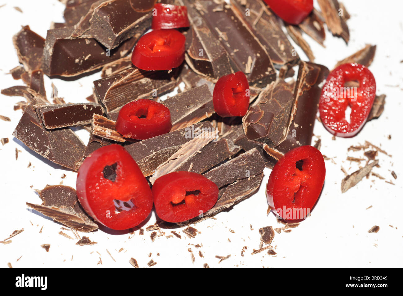 Chunks of chocolate with sliced chili peppers Stock Photo - Alamy