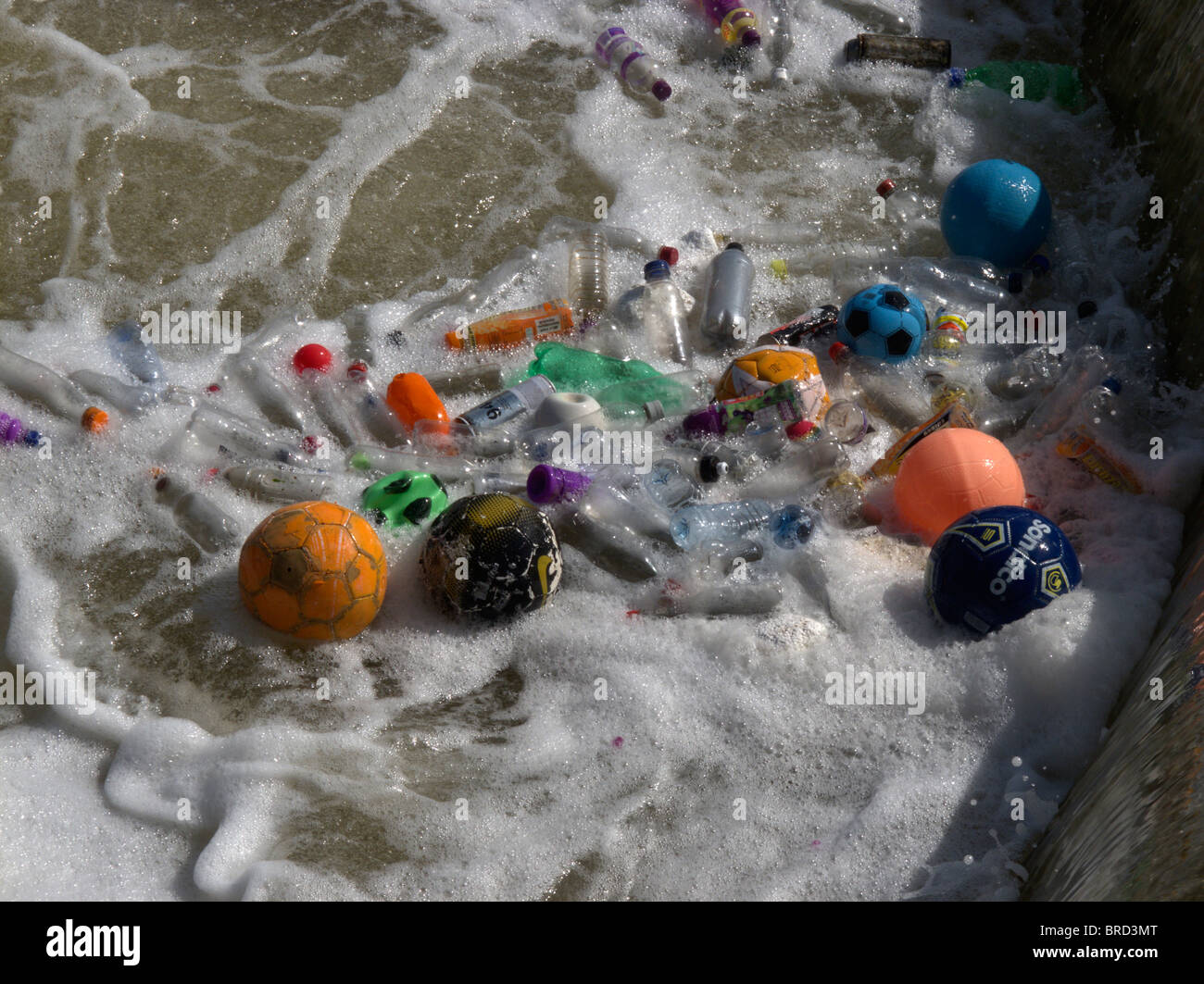 Rubbish dumped in water, Midlands, September 2010 Stock Photo - Alamy