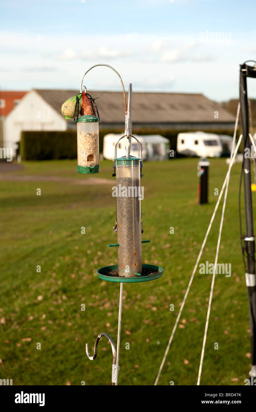 Bird Seed Feeder at Caravan Site UK Stock Photo - Alamy