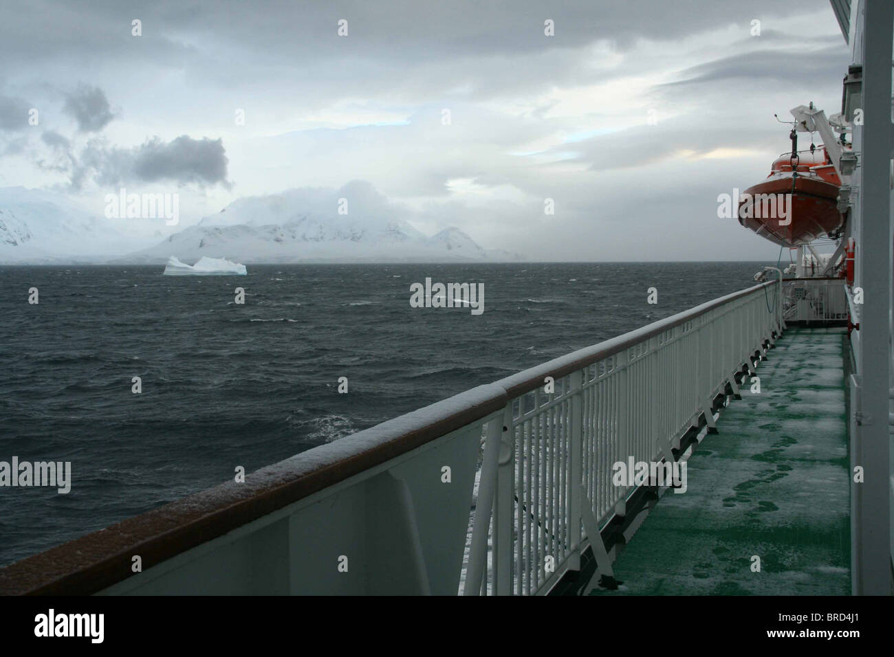 Life boat and cruise ship deck, light snow,dawn, South Shetland Islands ...