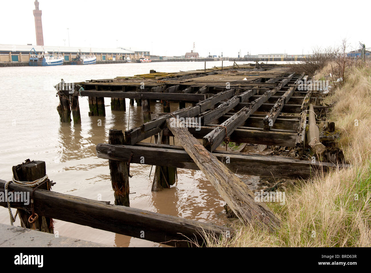 Rotten wood jetty Grimsby Fishing Port Lincolnshire UK Stock Photo - Alamy