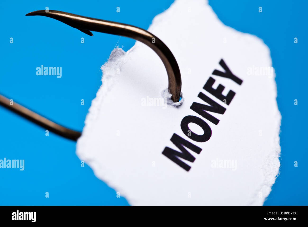 Money on hook Stock Photo - Alamy