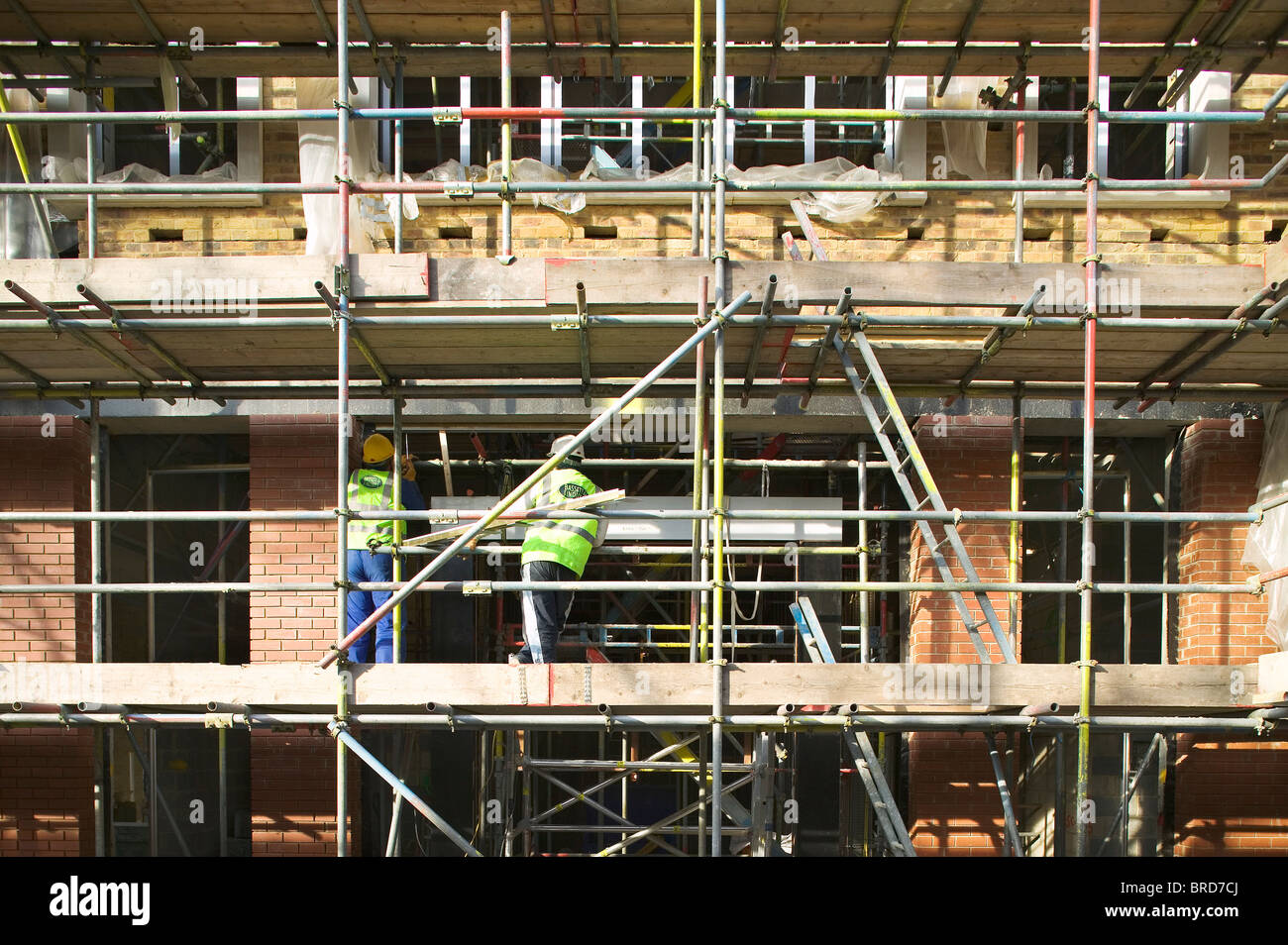 House in construction with scaffolding Stock Photo - Alamy