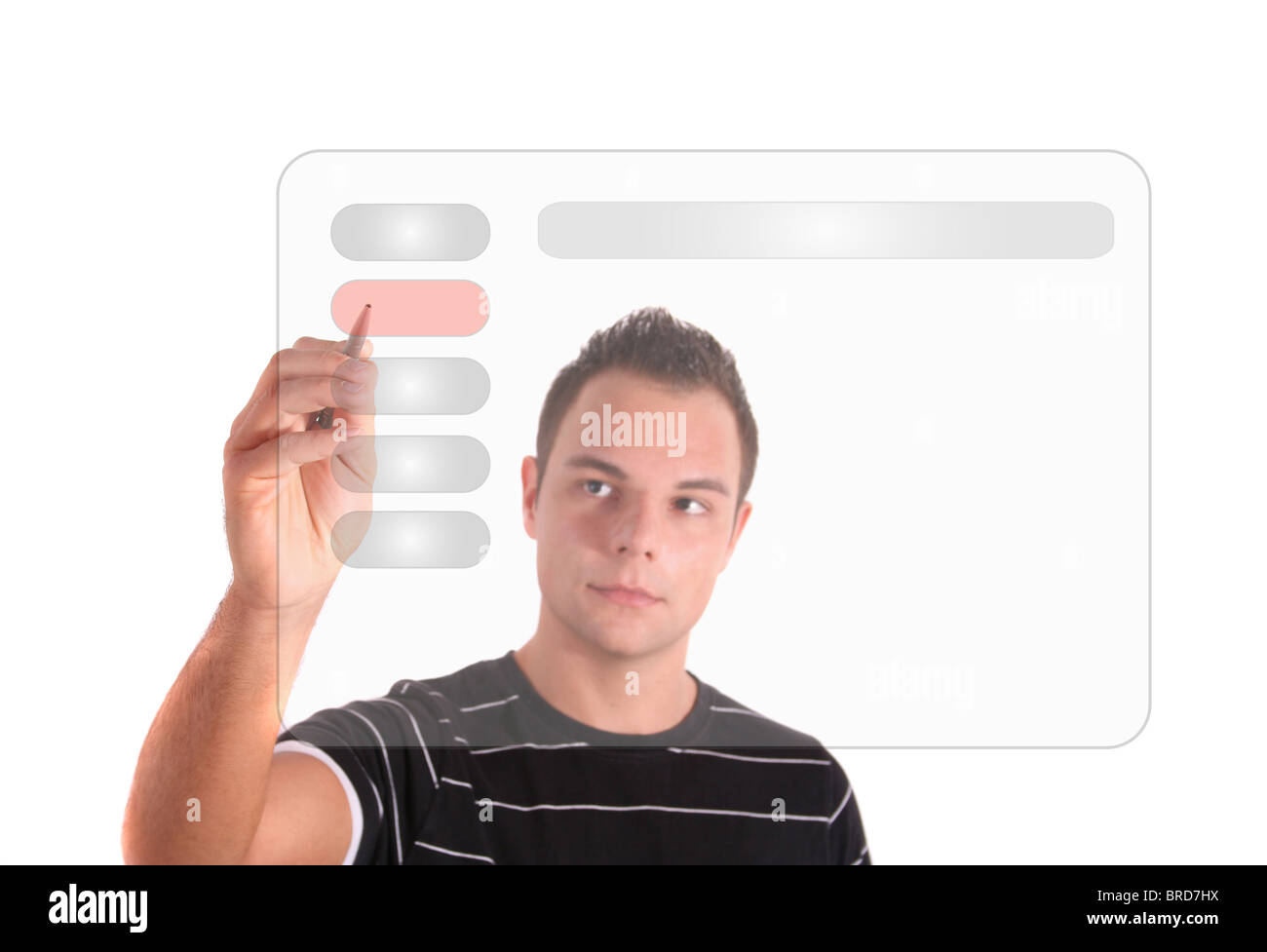 A handsome young man using a modern interface. All isolated on white ...