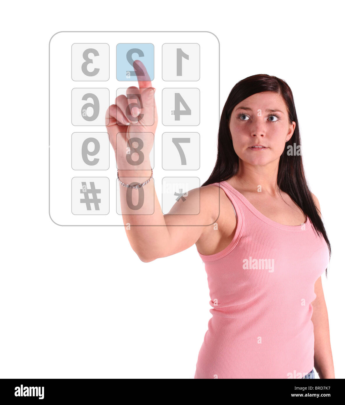 A young handsome woman enters her personal access code. All isolated on ...