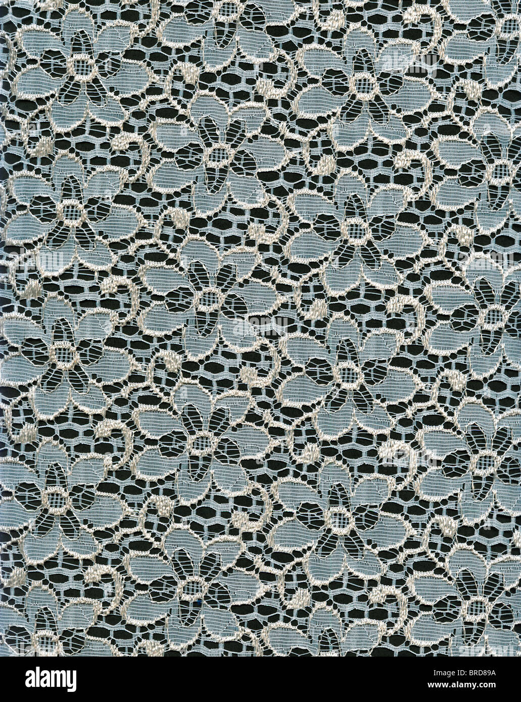 Close-up of tulle with floral pattern on a dark background Stock Photo ...