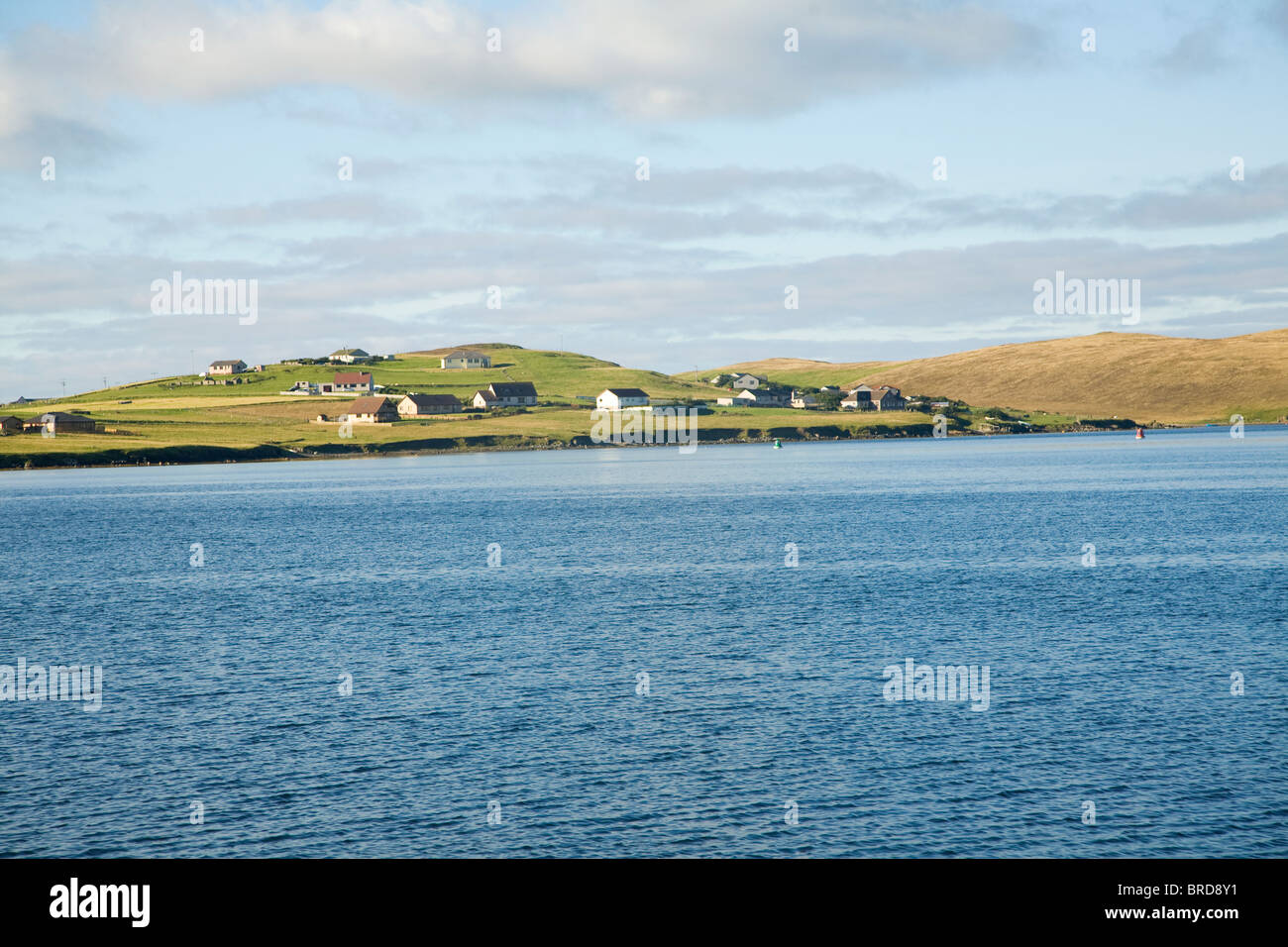 Houses on Trondra island across East Voe of Scalloway, Shetland Islands ...