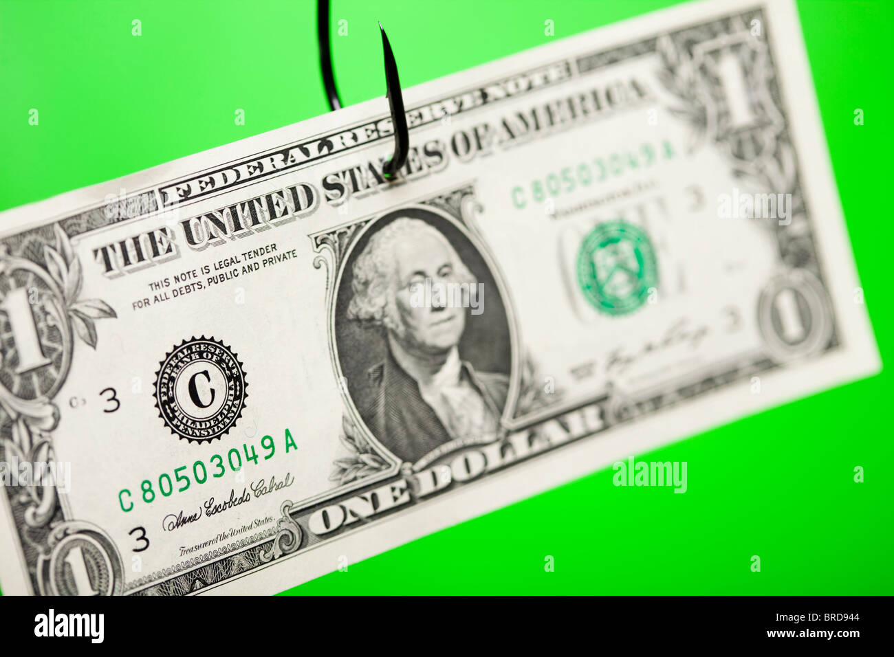 Dollar on hook Stock Photo - Alamy