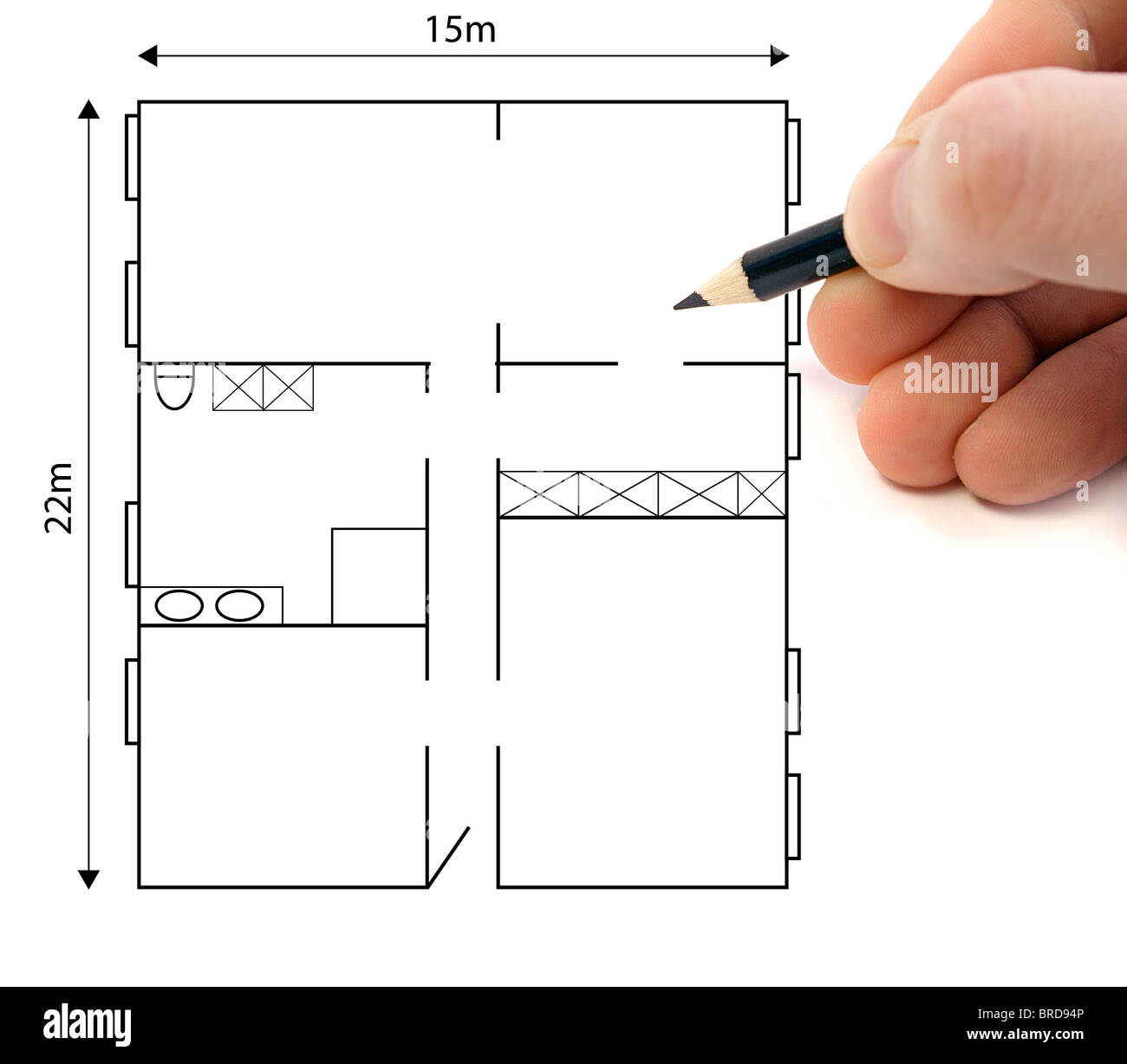 A hand drawing a ground plan to plan a building project Stock Photo - Alamy