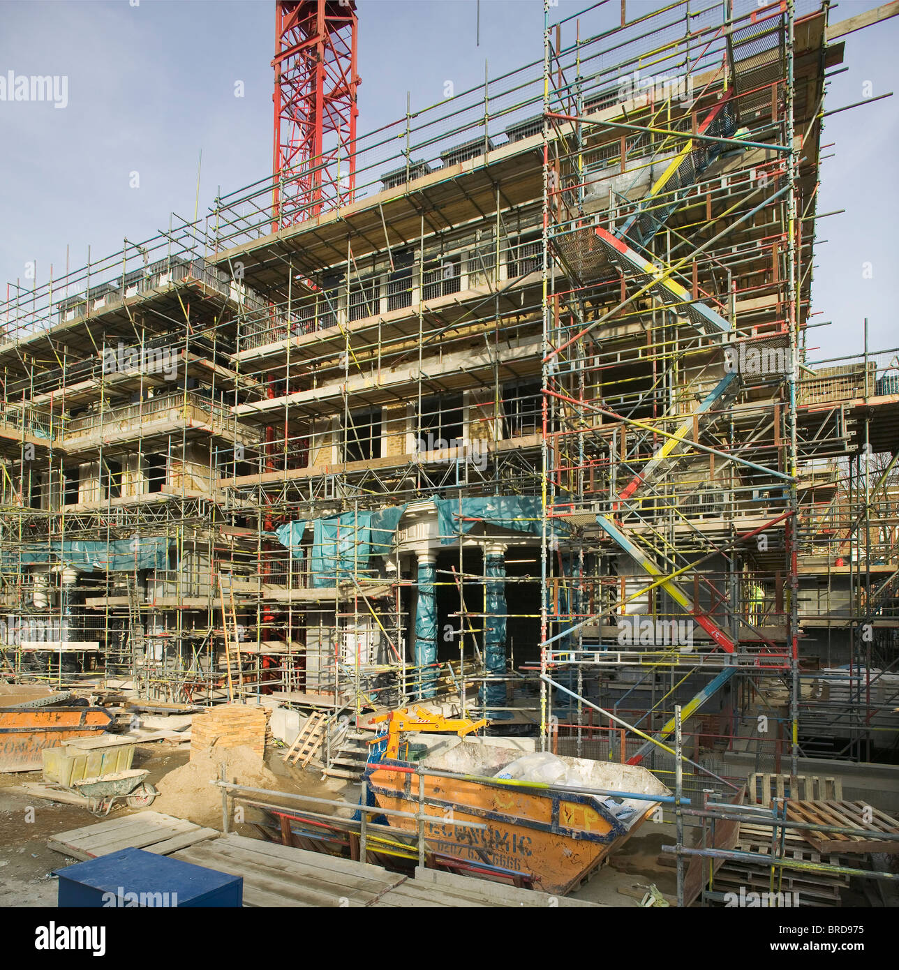 House in construction with scaffolding Stock Photo - Alamy