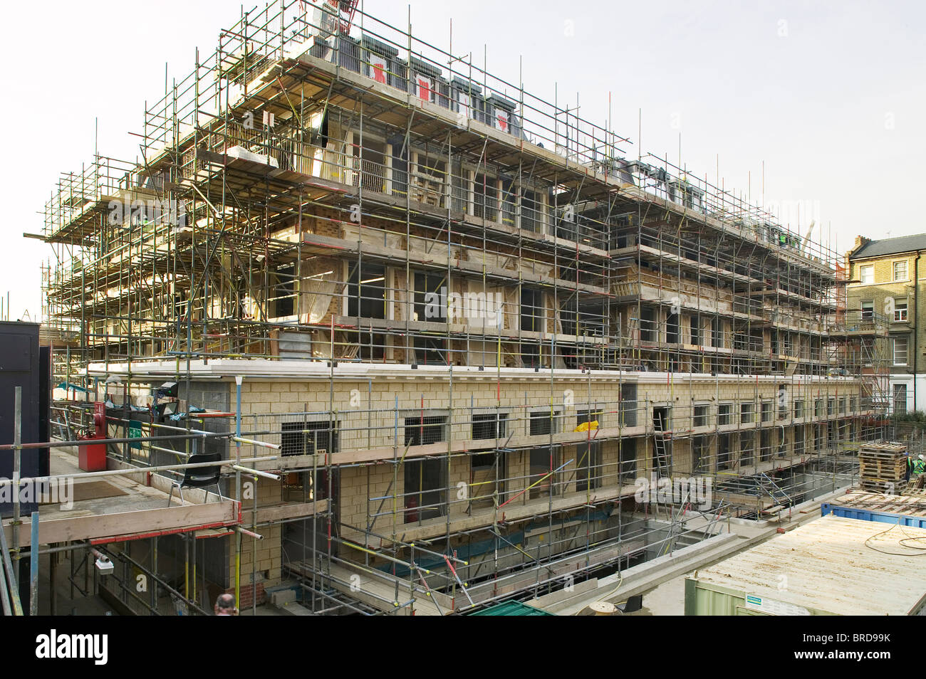 House in construction with scaffolding Stock Photo - Alamy