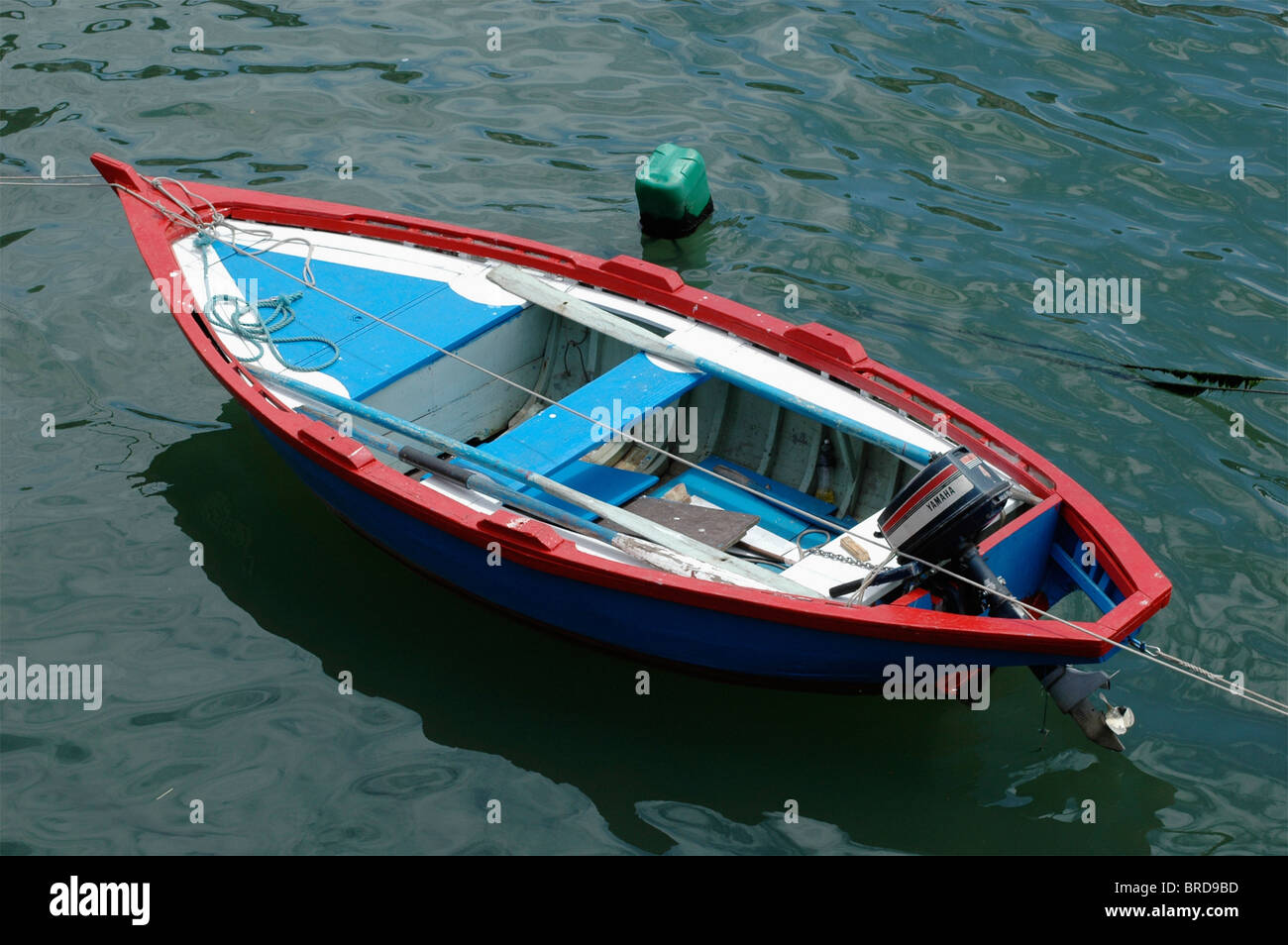 Wooden rowboat with an outboard engine well in Porto, Portugal Stock ...