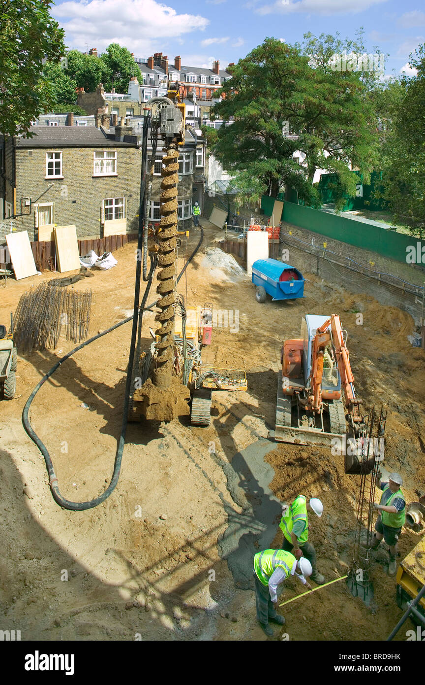 Piling machineon building site Stock Photo - Alamy