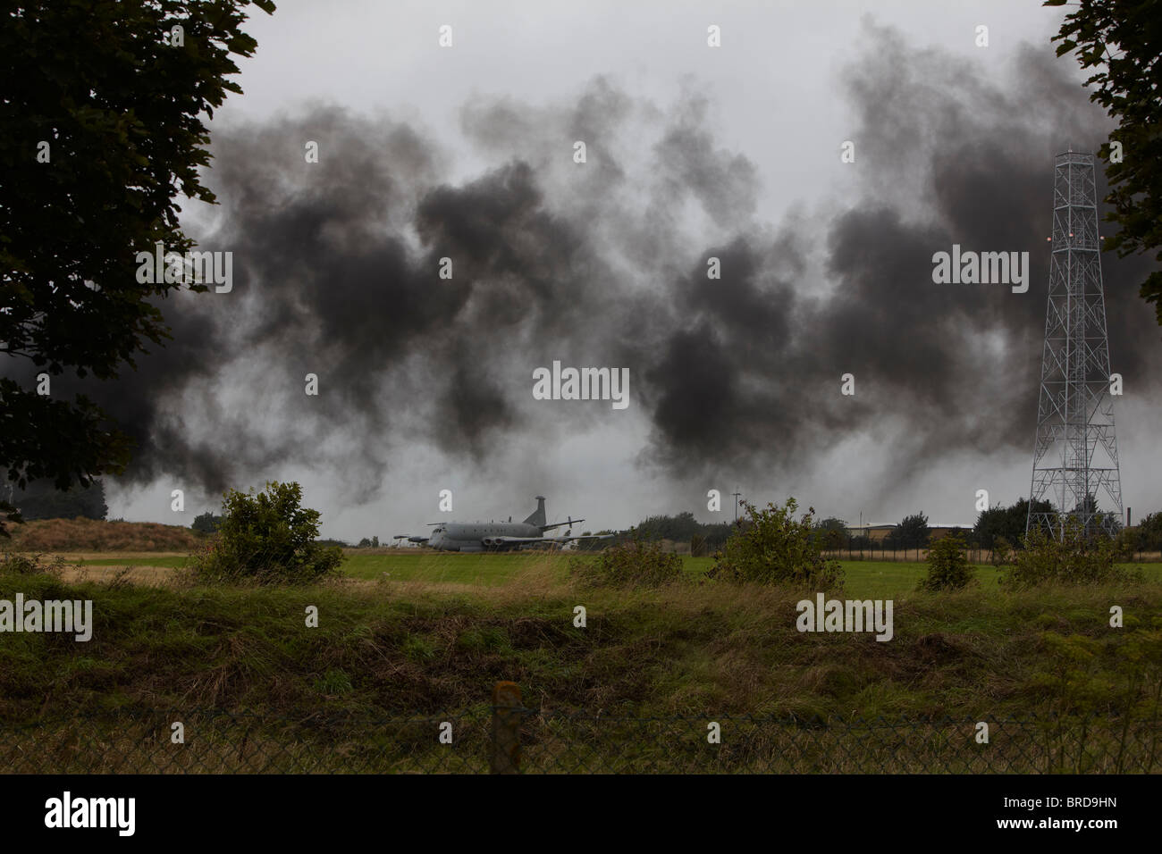 Plane on fire Stock Photo - Alamy