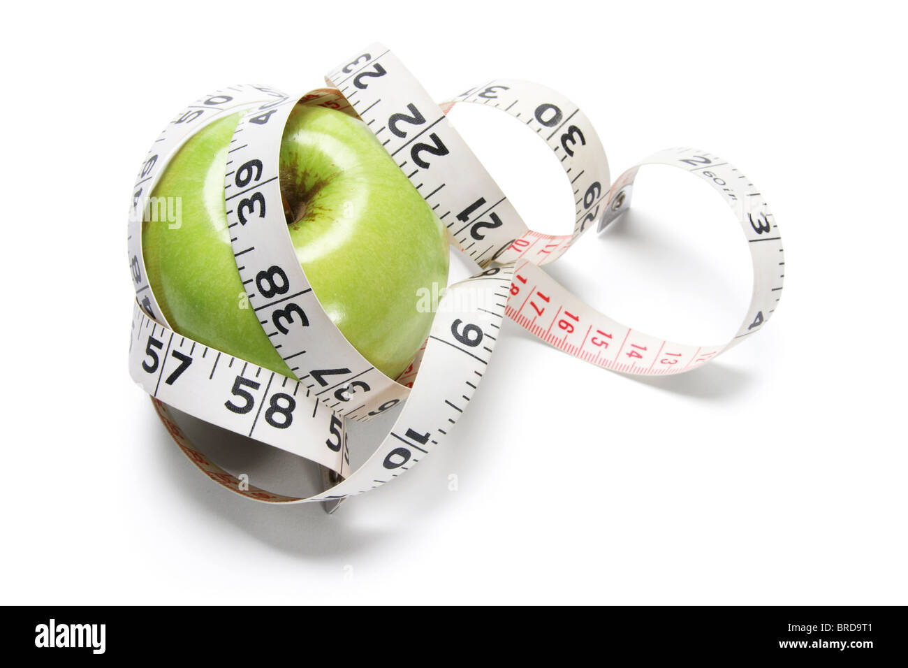 Tape Measure Around Green Apple Stock Photo - Alamy