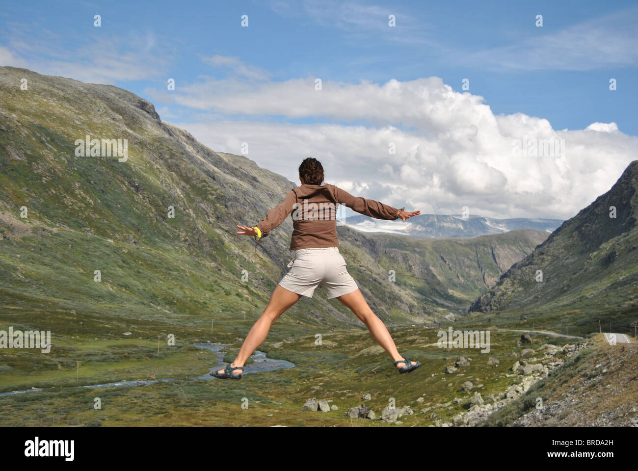 Jump mountain rock leap hi-res stock photography and images - Alamy