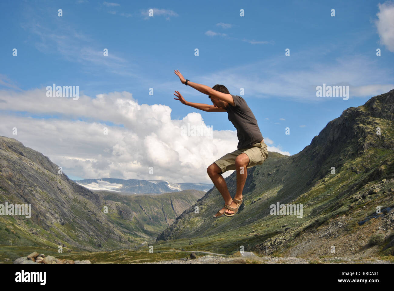 Jump mountain rock leap hi-res stock photography and images - Alamy