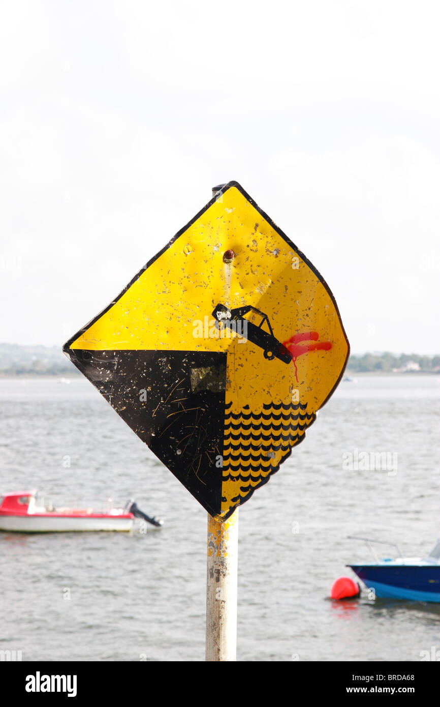 a warning sign on an irish quay Stock Photo - Alamy