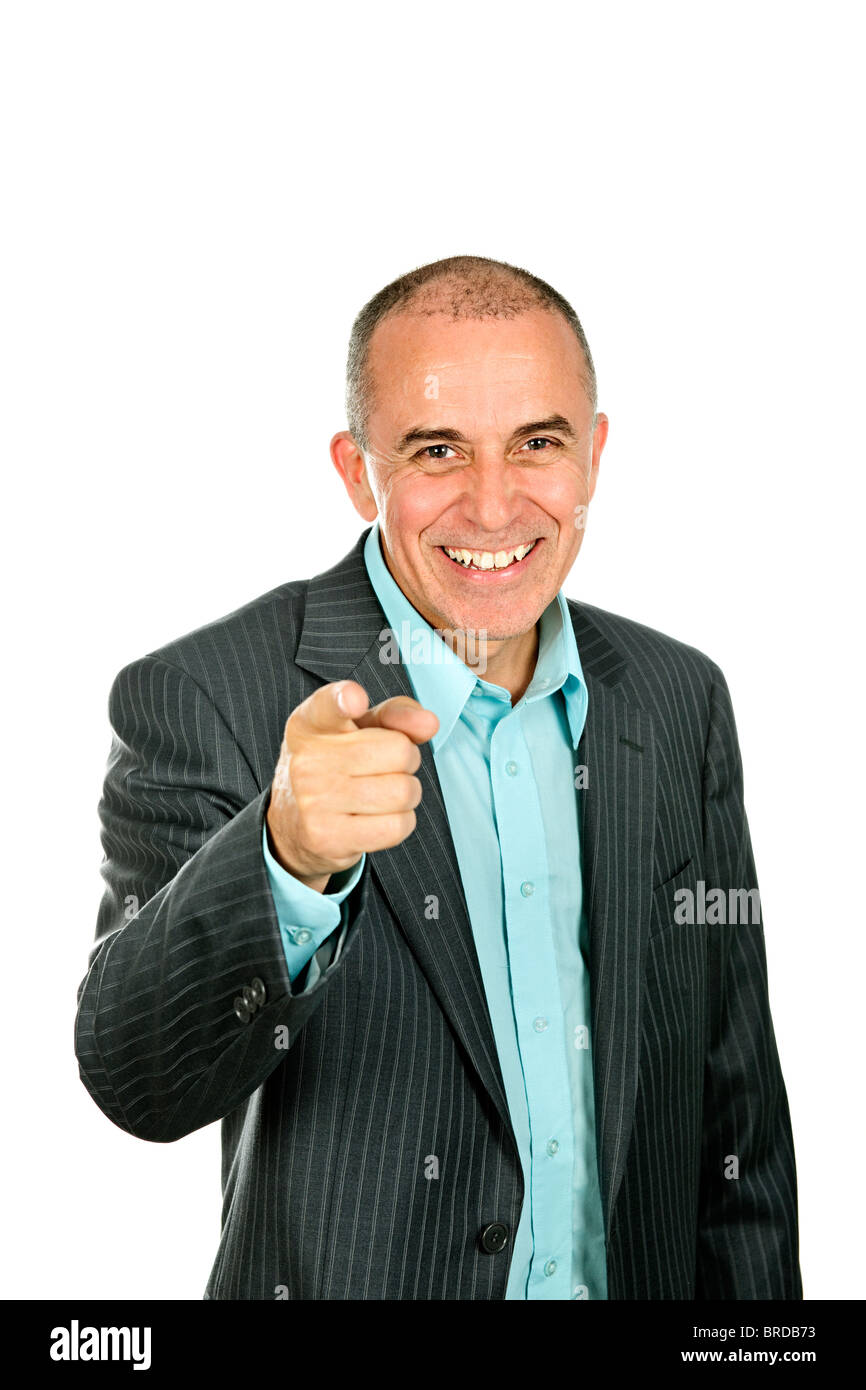 Portrait of smiling pointing businessman isolated on white background ...