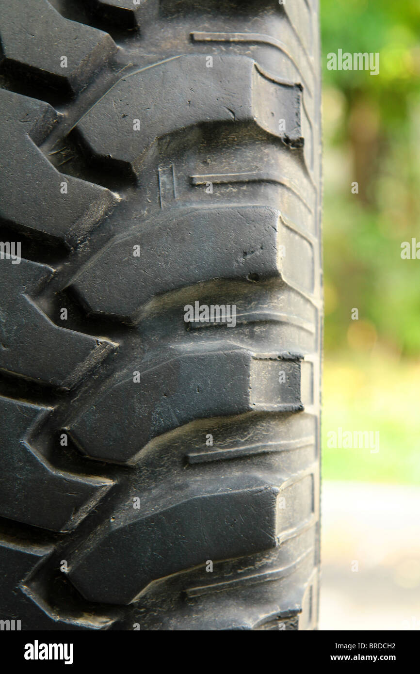Black wheels on a car in an outdoor Stock Photo - Alamy
